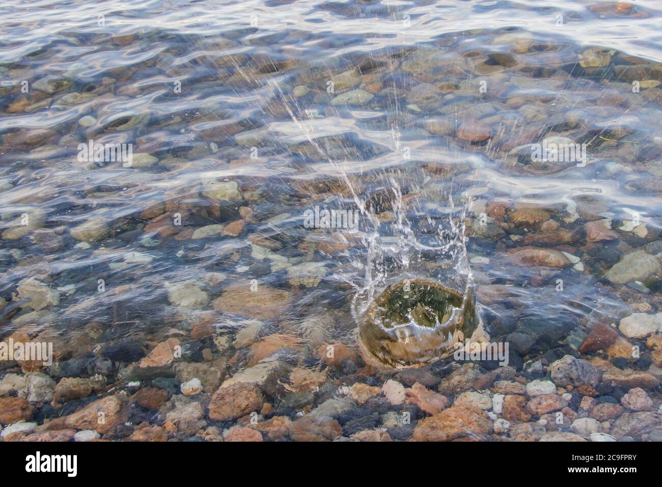 Ripples stone thrown into the water hi-res stock photography and images ...