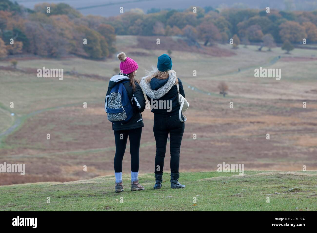 Two Girl Hikers Surveying The English Countryside England UK Stock ...