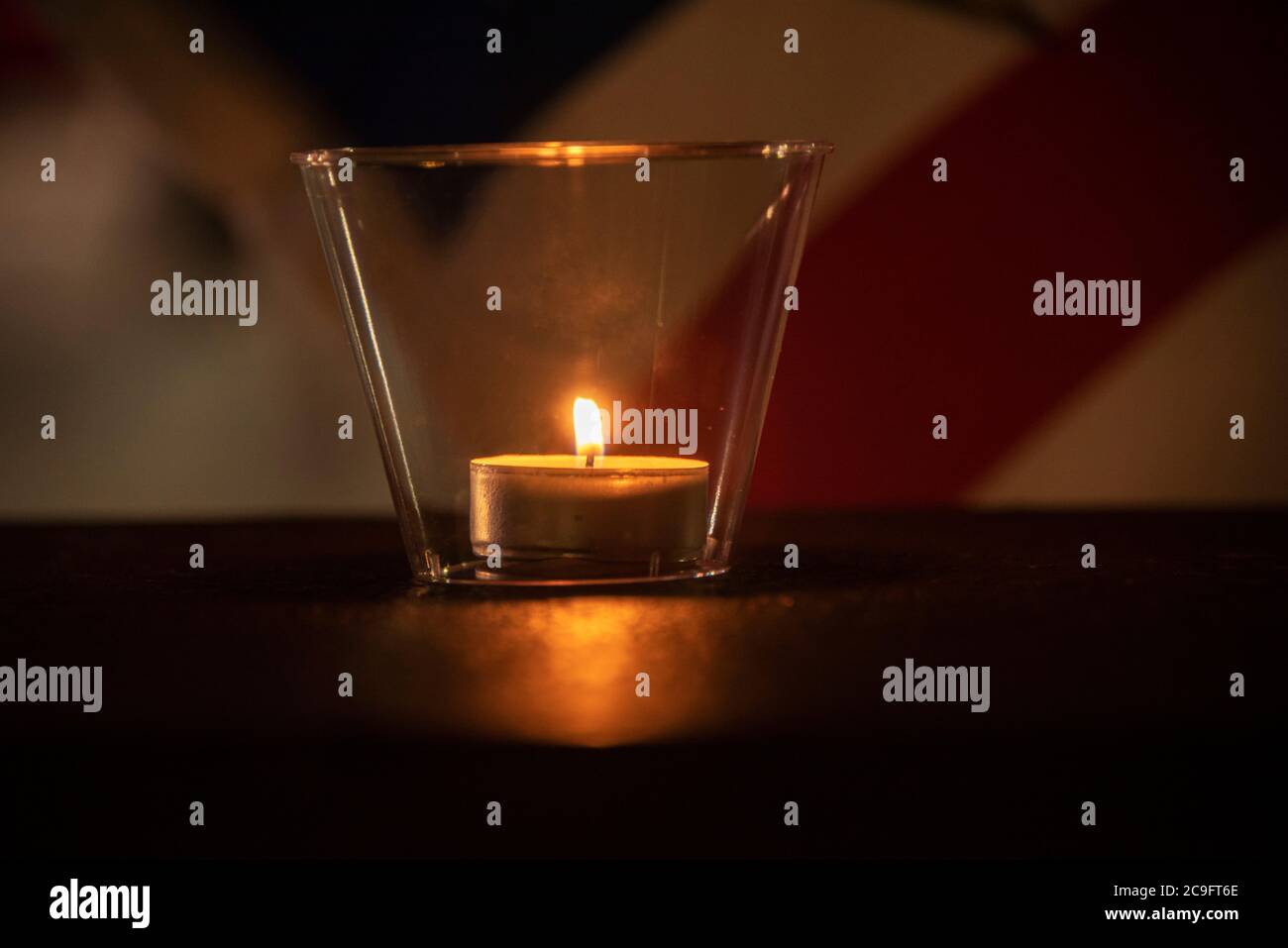 Candle and the American flag on September 11 anniversary Stock Photo ...