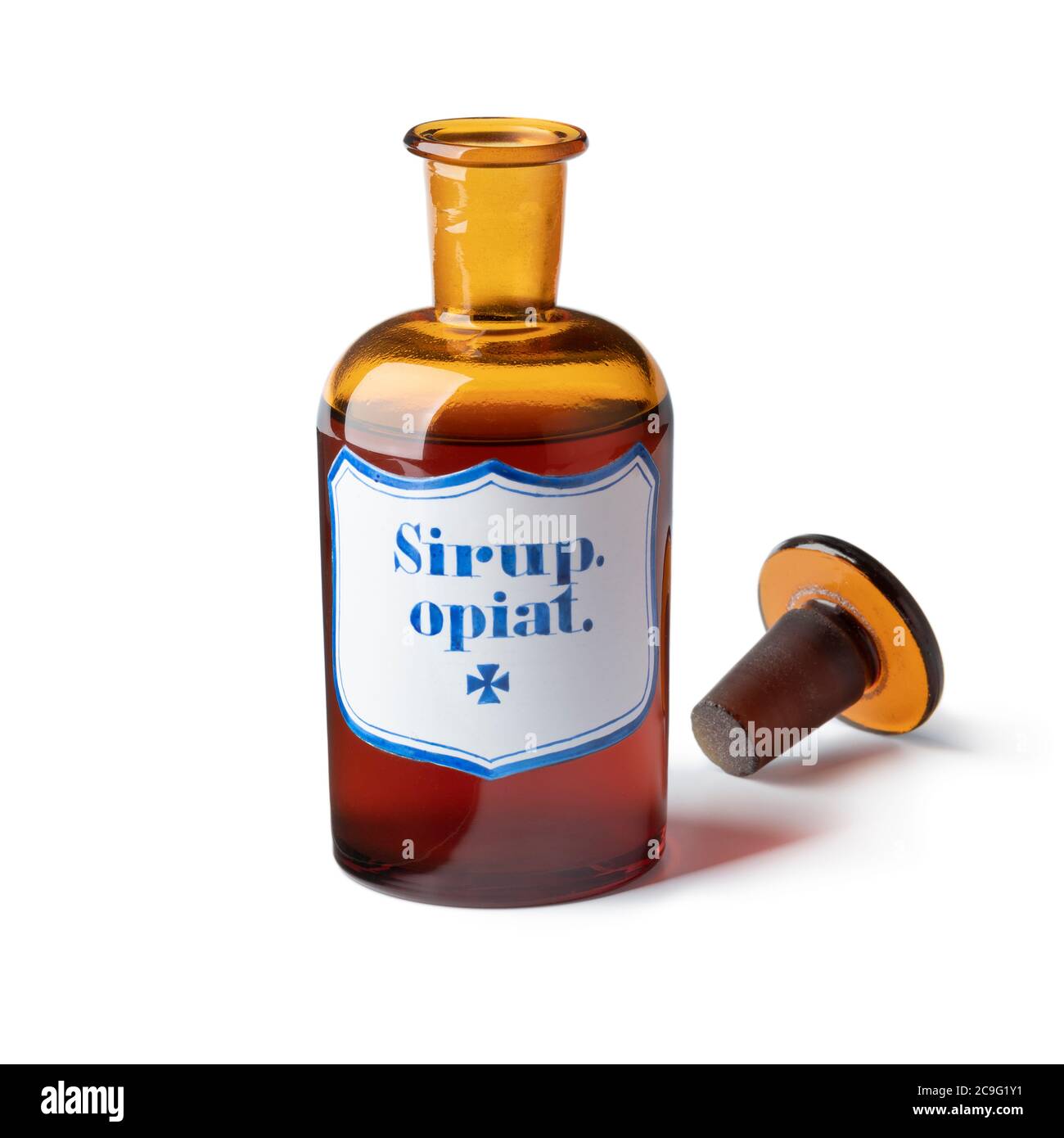 Historic old open pharmacy bottle with opium syrup isolated on white ...