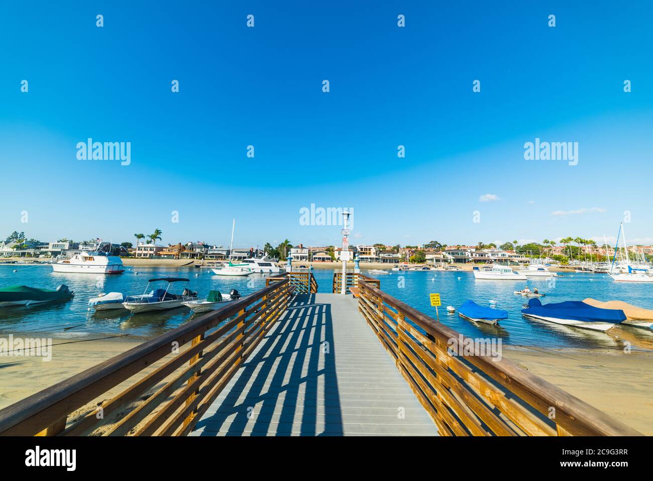 Wooden dock in Balboa island harbor in Orange County. Southern ...