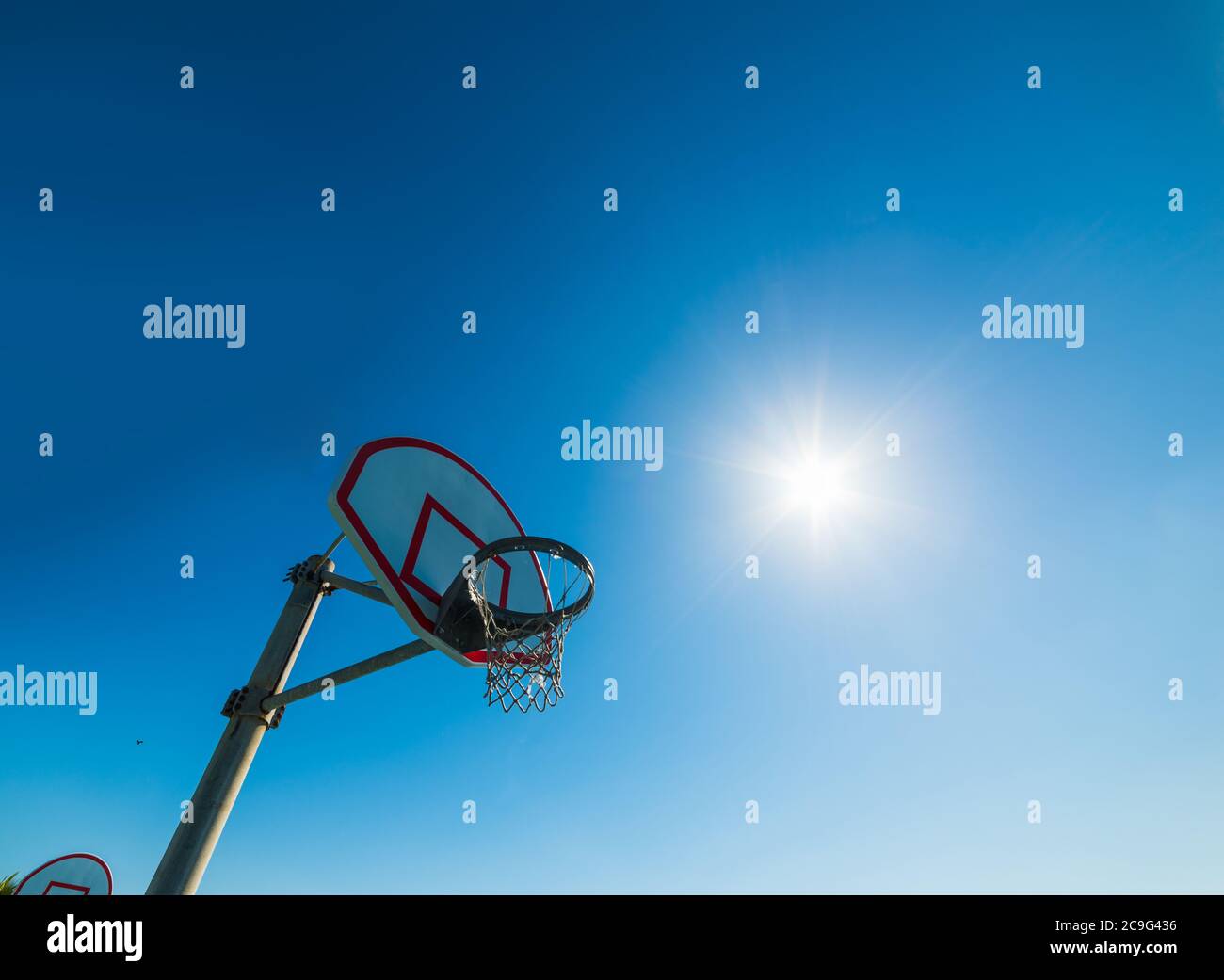 Basketball hoop under a shining sun in Laguna Beach, Orange county ...