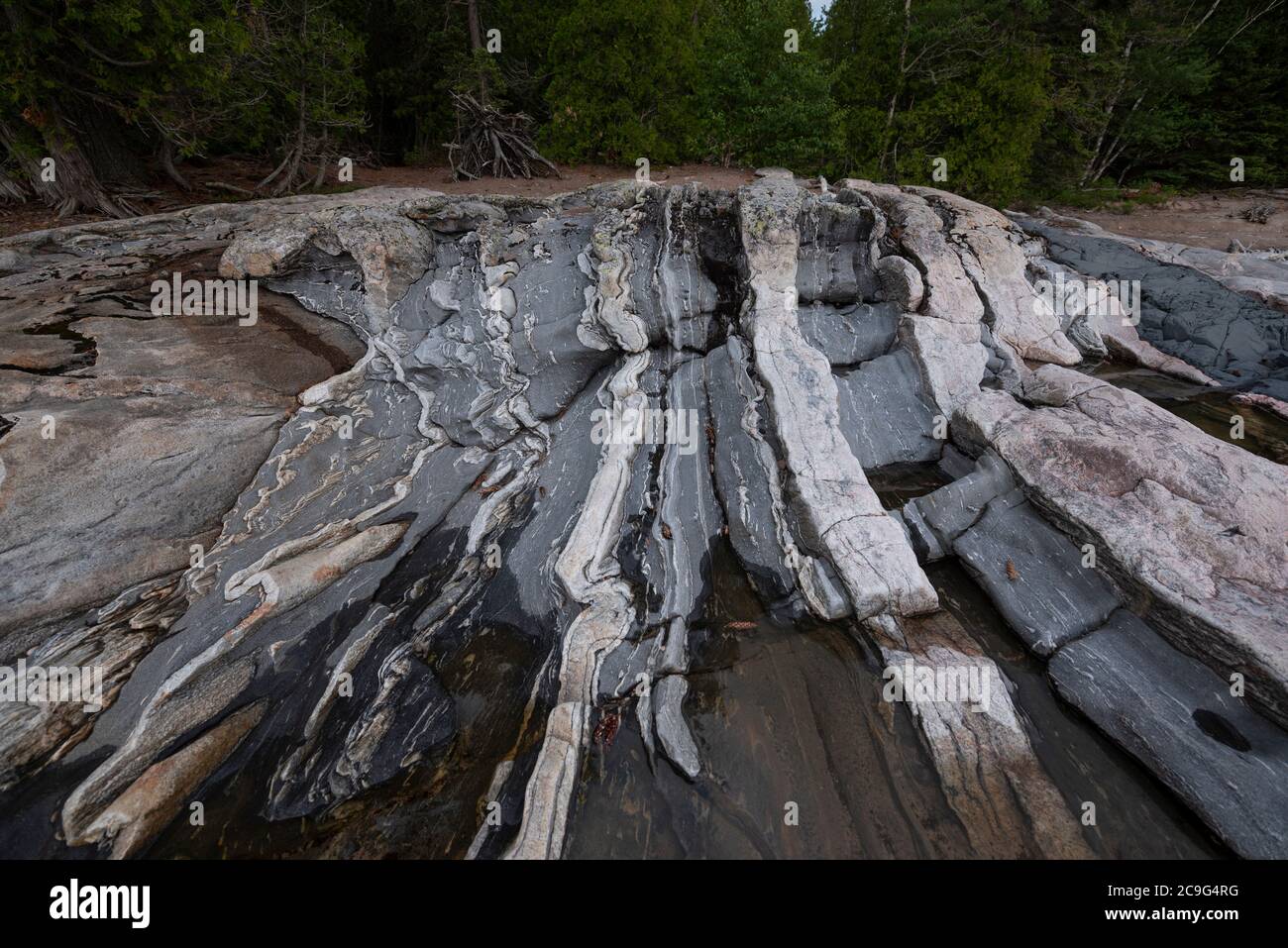 Granite and basalt-mixed bedrock along the northern shore of Lake ...