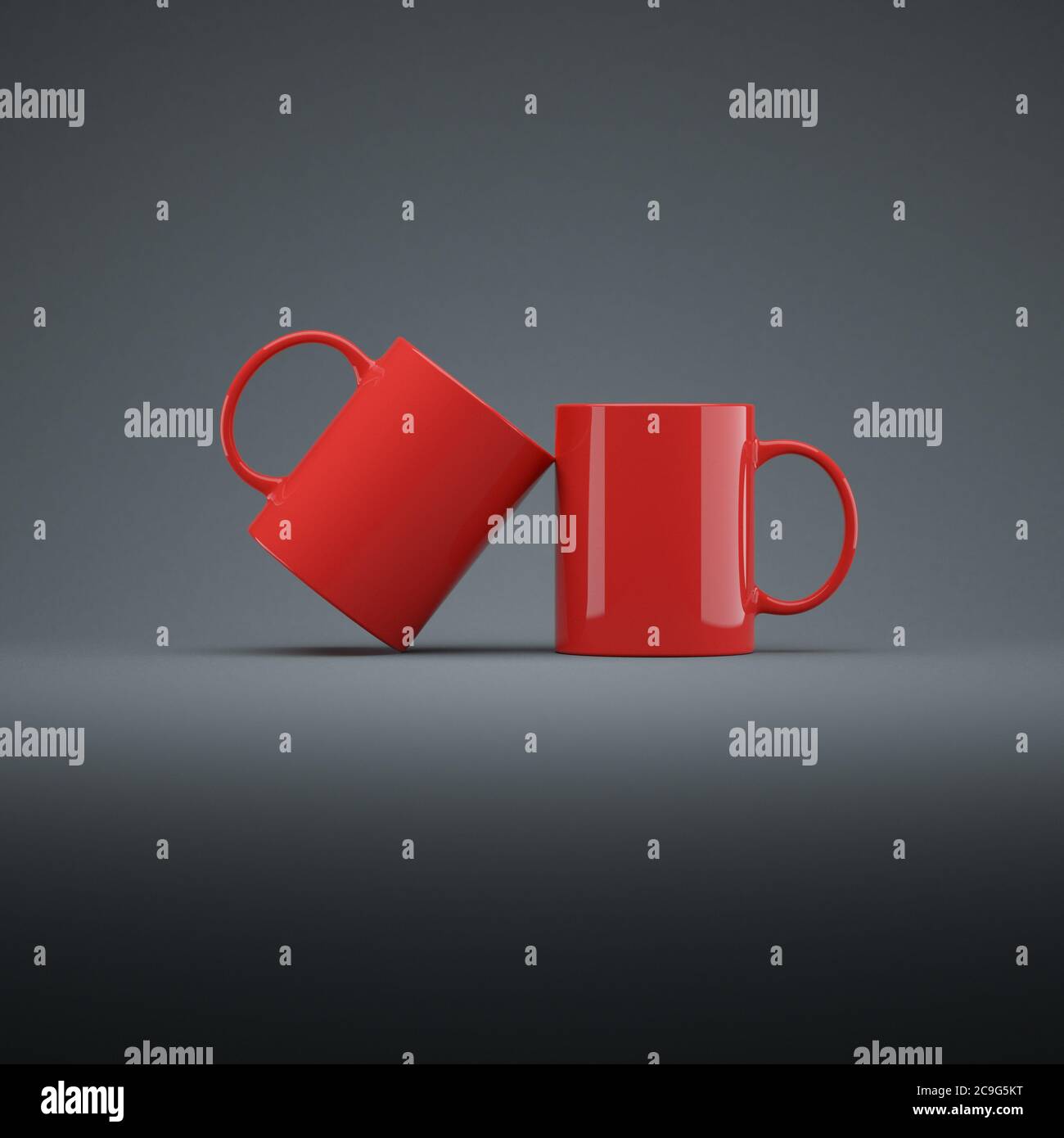 Two red ceramic cups. Dark background Stock Photo - Alamy