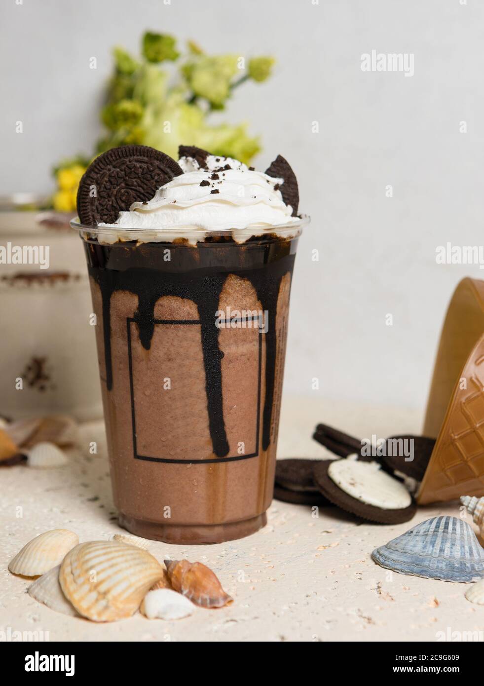 Cold chocolate drink in plastic cup close up Stock Photo - Alamy