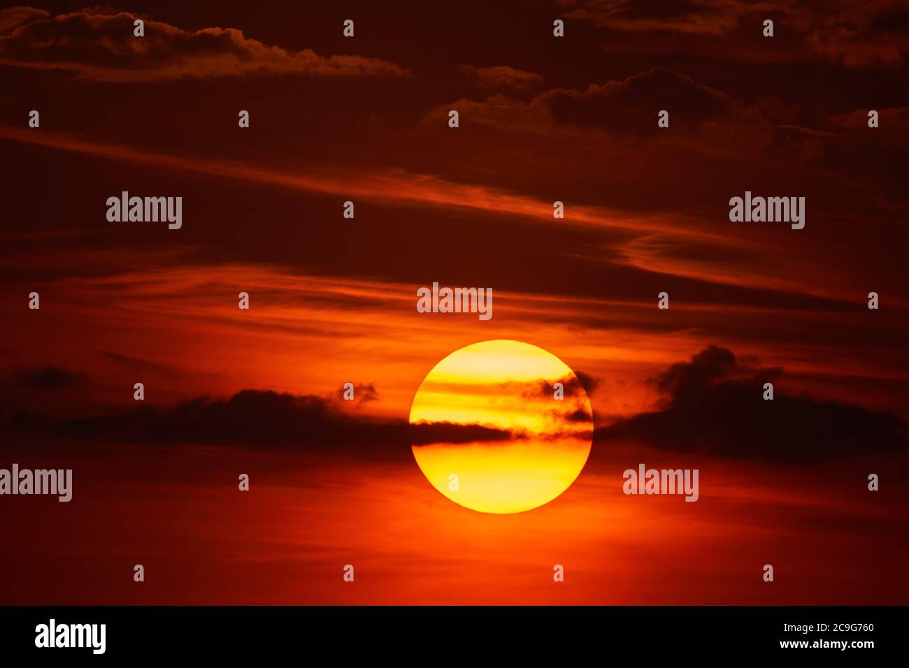 Telephoto shot sun setting hi-res stock photography and images - Alamy