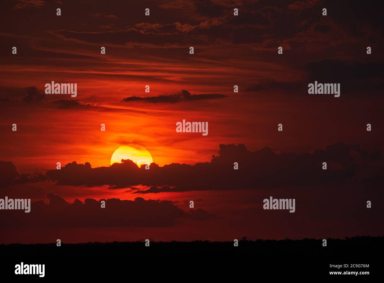 Telephoto shot sun setting hi-res stock photography and images - Alamy