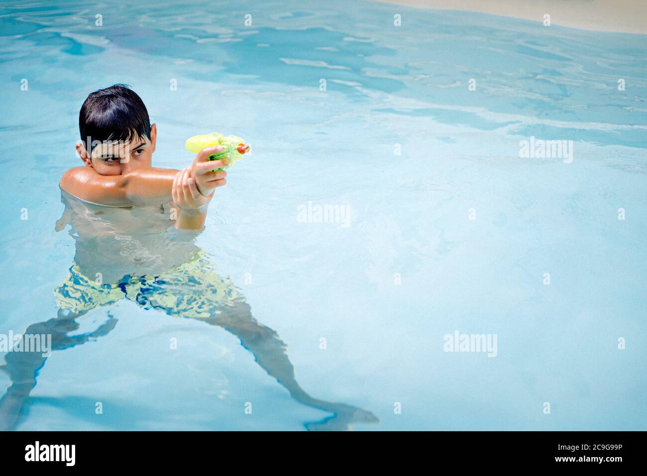 Children playing with a toy gun hi-res stock photography and images - Alamy