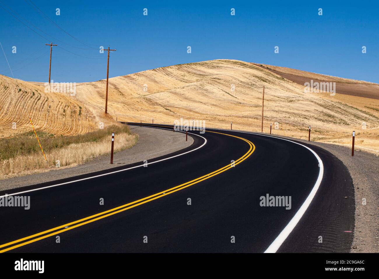 Recently paved highway through the Palouse farming district of eastern ...