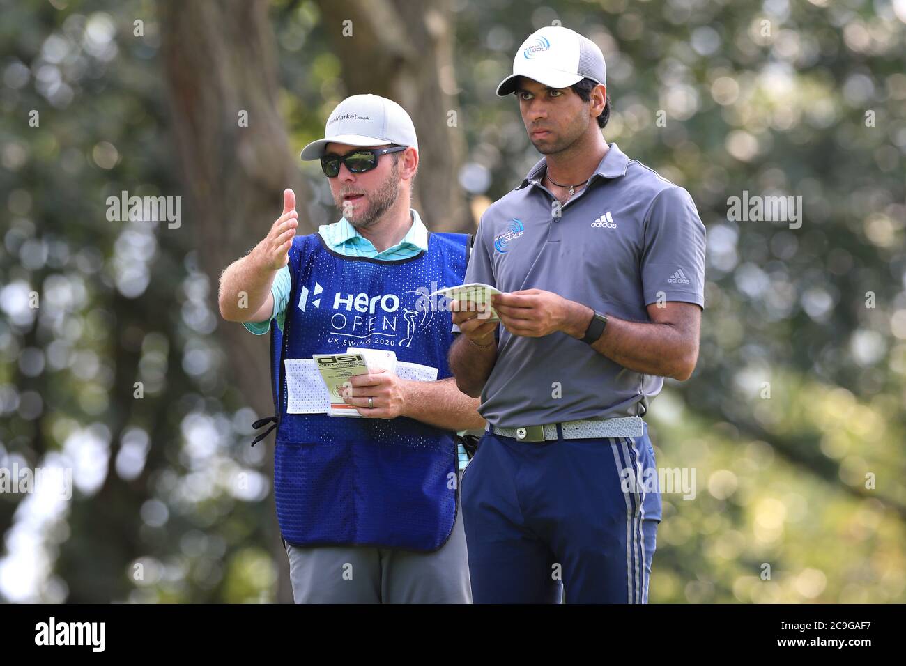 England's Aaron Rai (right) with his caddy on the 10th during day two ...