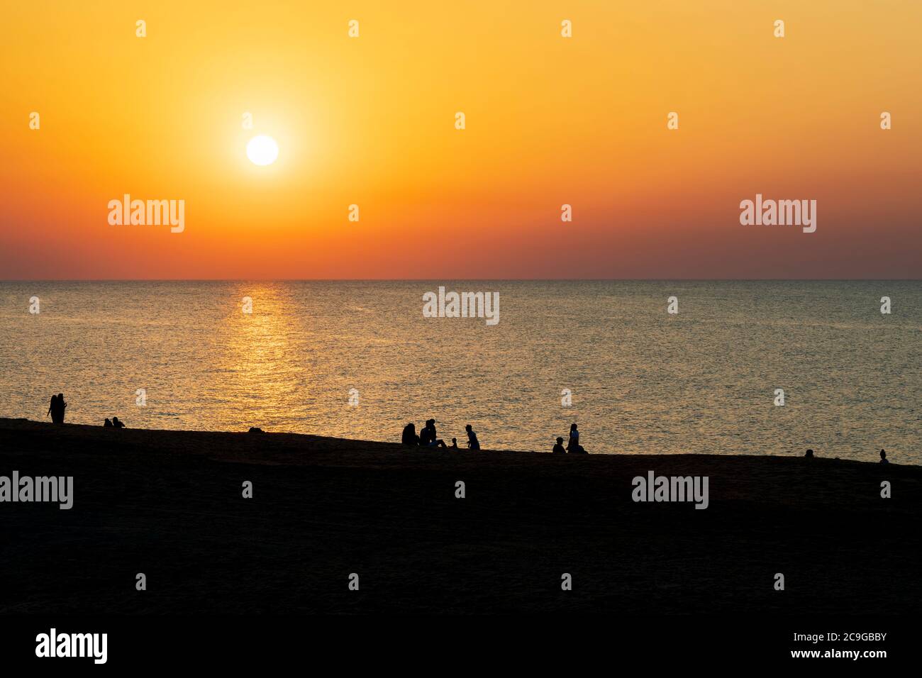 Sunset on the beach in Baku Stock Photo - Alamy
