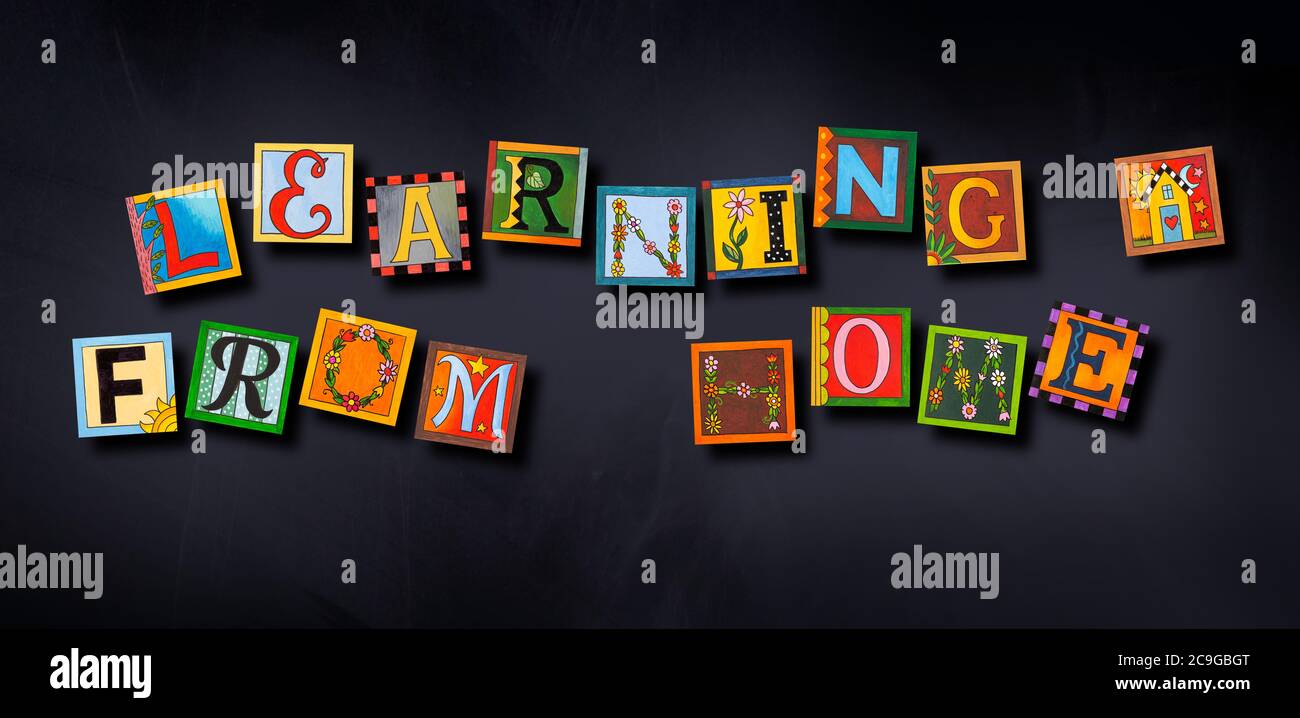 " Learning From Home " words on a blackboard top view. Overhead, from ...