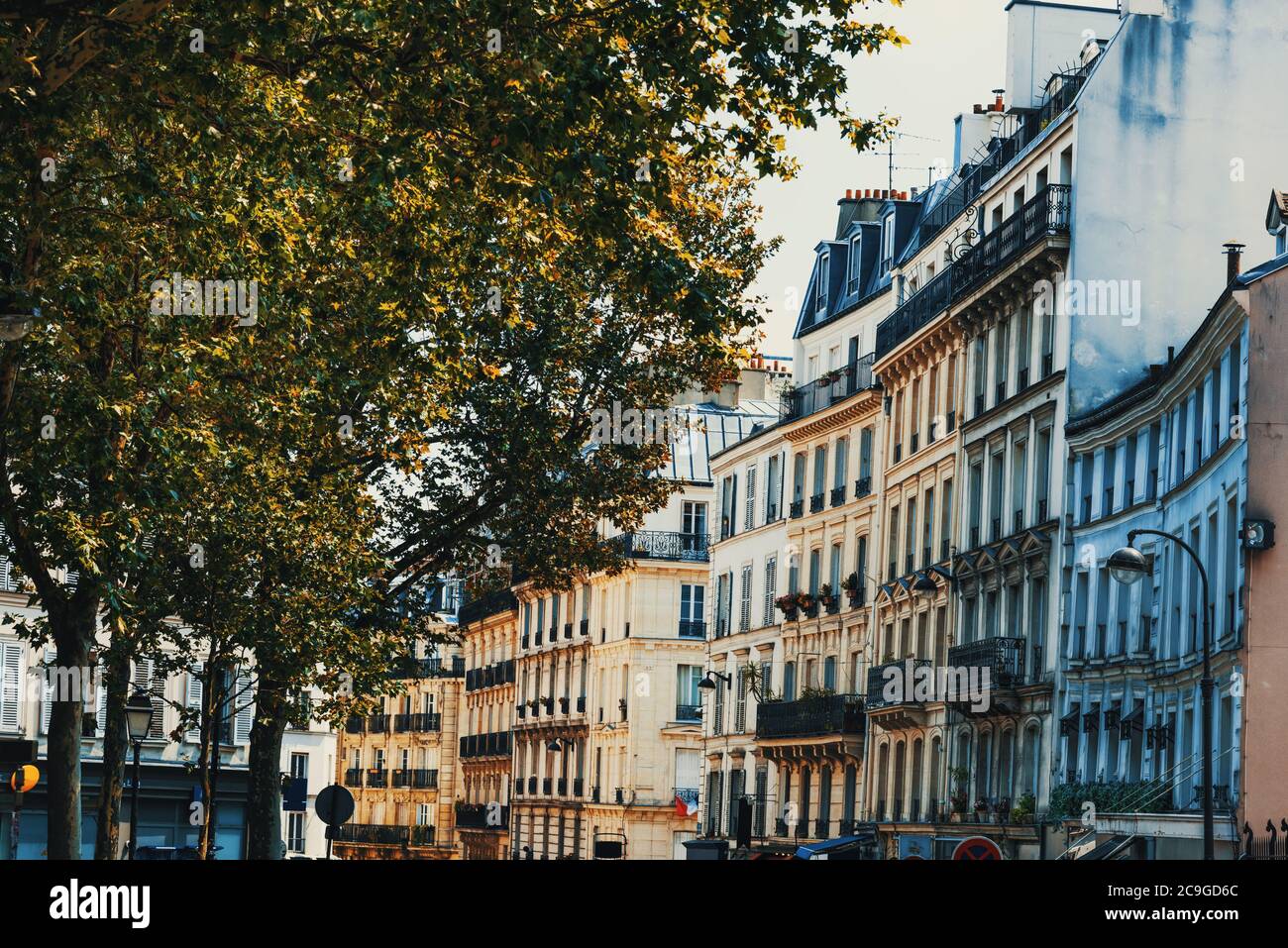 Trees and luxury buildings in Montmartre. Paris, France Stock Photo - Alamy