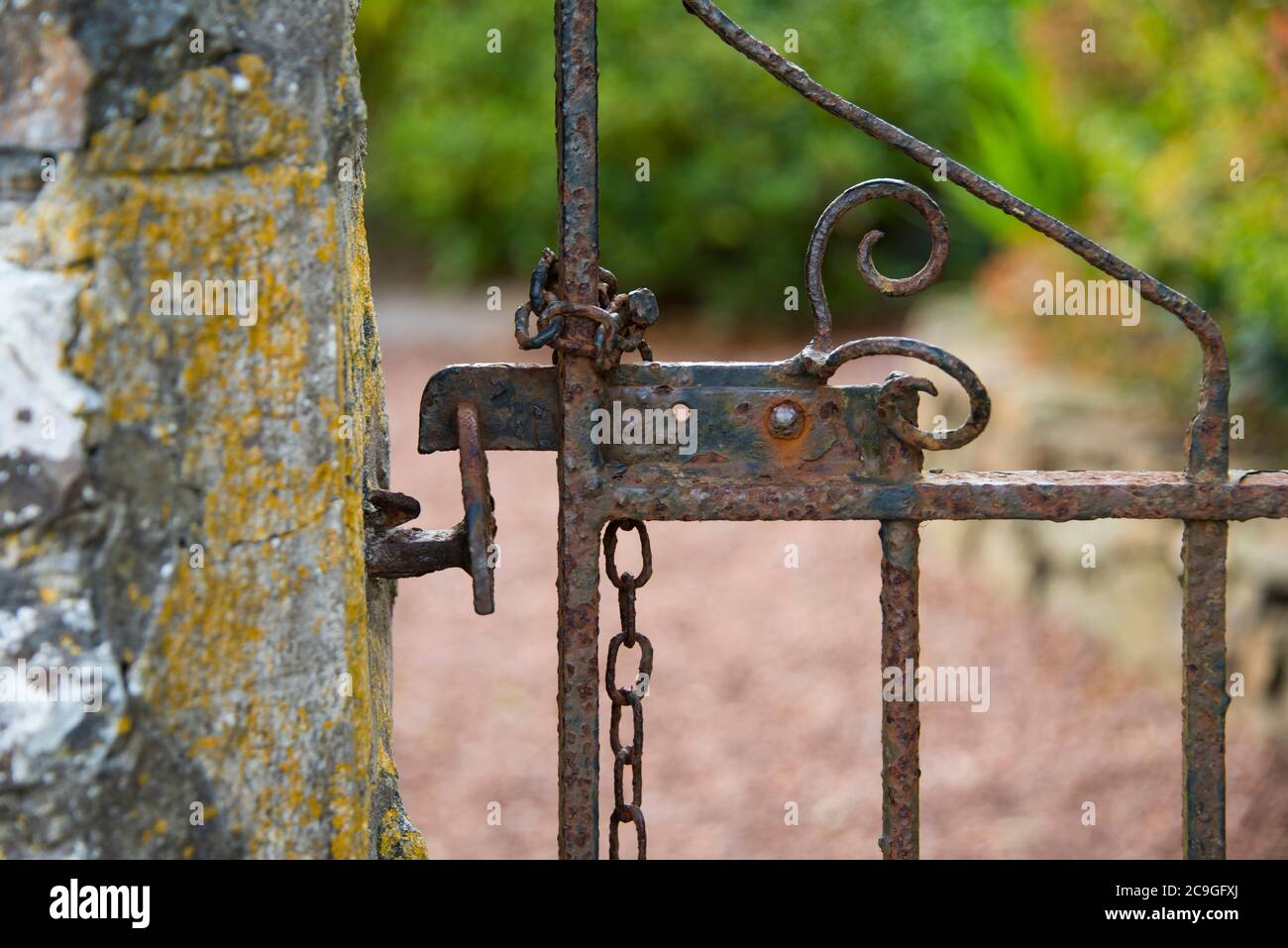 Garden gate and rusted wrought iron latch Stock Photo - Alamy