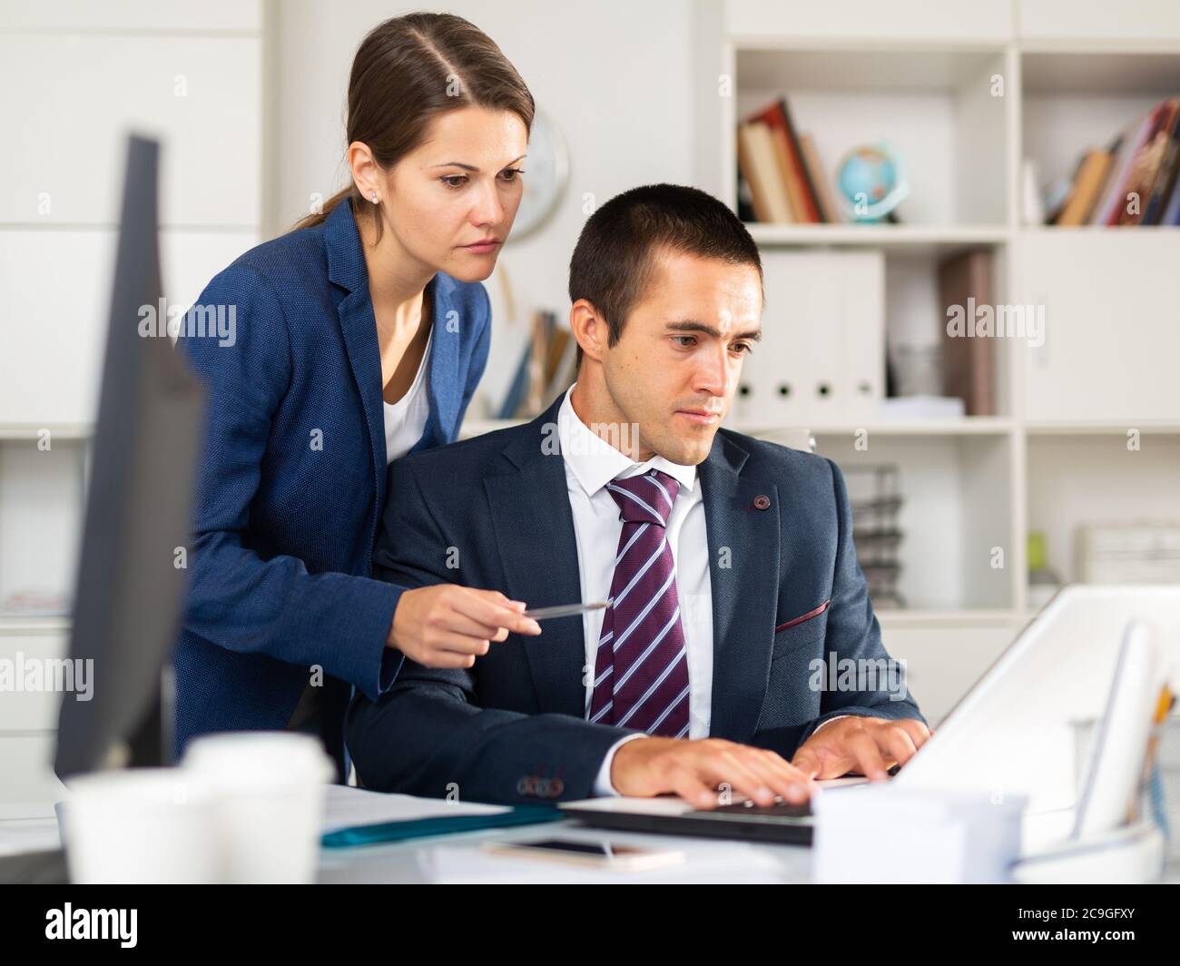 Directors assistant makes daily routine and writes down instructions ...