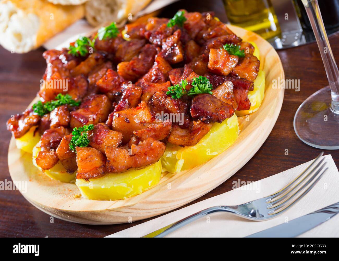Spanish dish - roasted pig nose and cheeks Stock Photo - Alamy