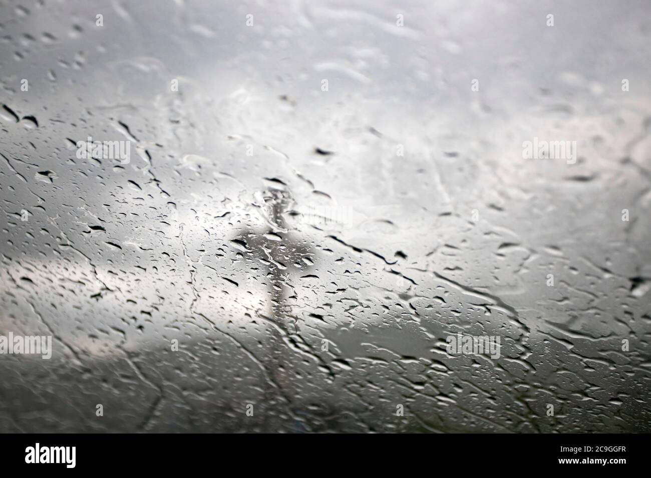 Dramatic religious photo of cross on a rainy day Stock Photo - Alamy