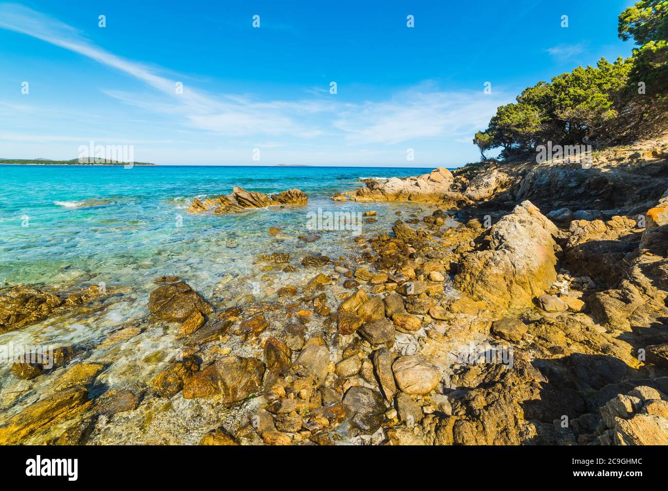 Rena Bianca rocky shore in Costa Smeralda, Italy Stock Photo - Alamy