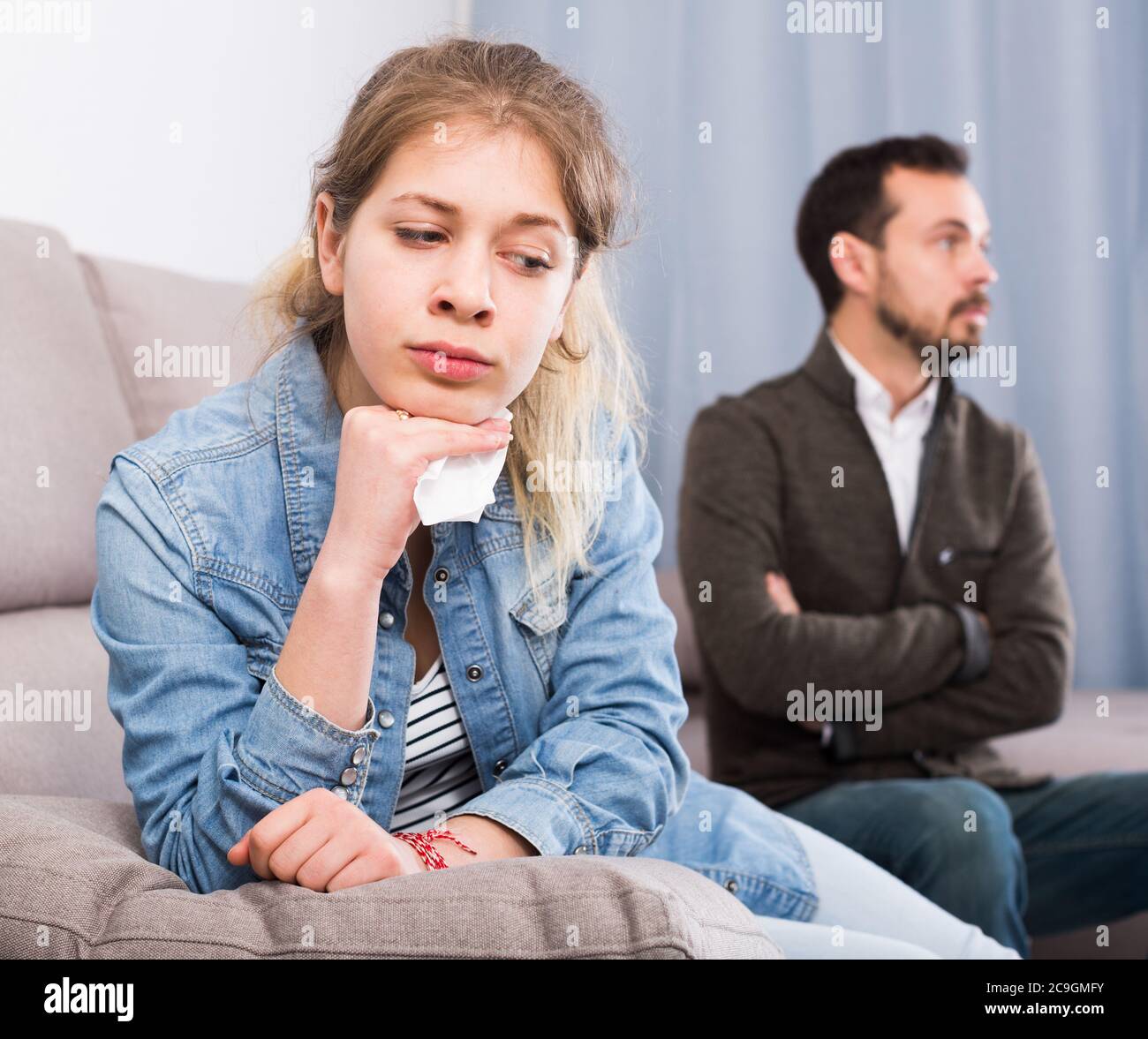 Young father having disagreement with daughter teenager at home Stock ...
