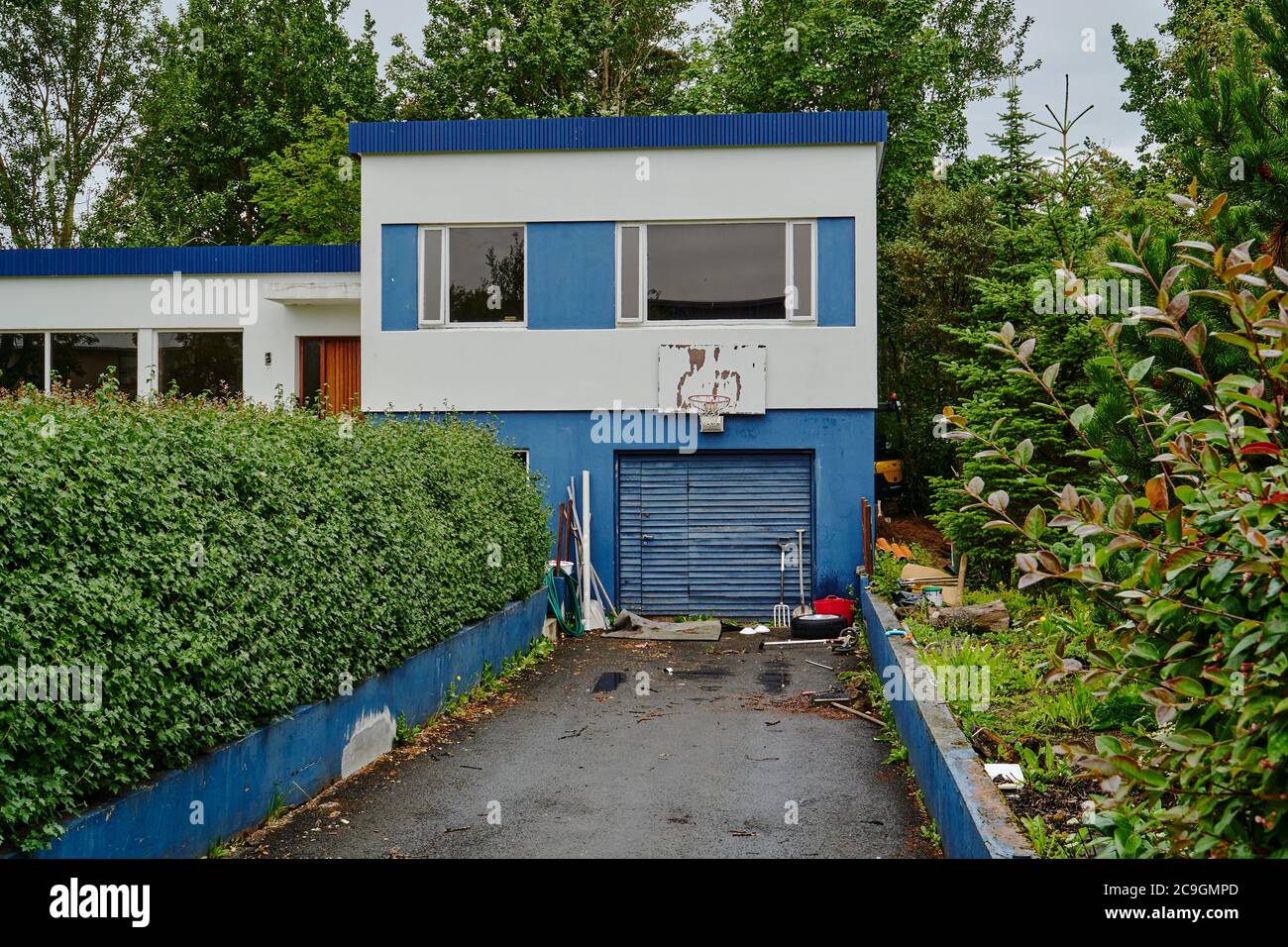 Architectural details and lush garden scenery in west Kópavogur, 50s ...