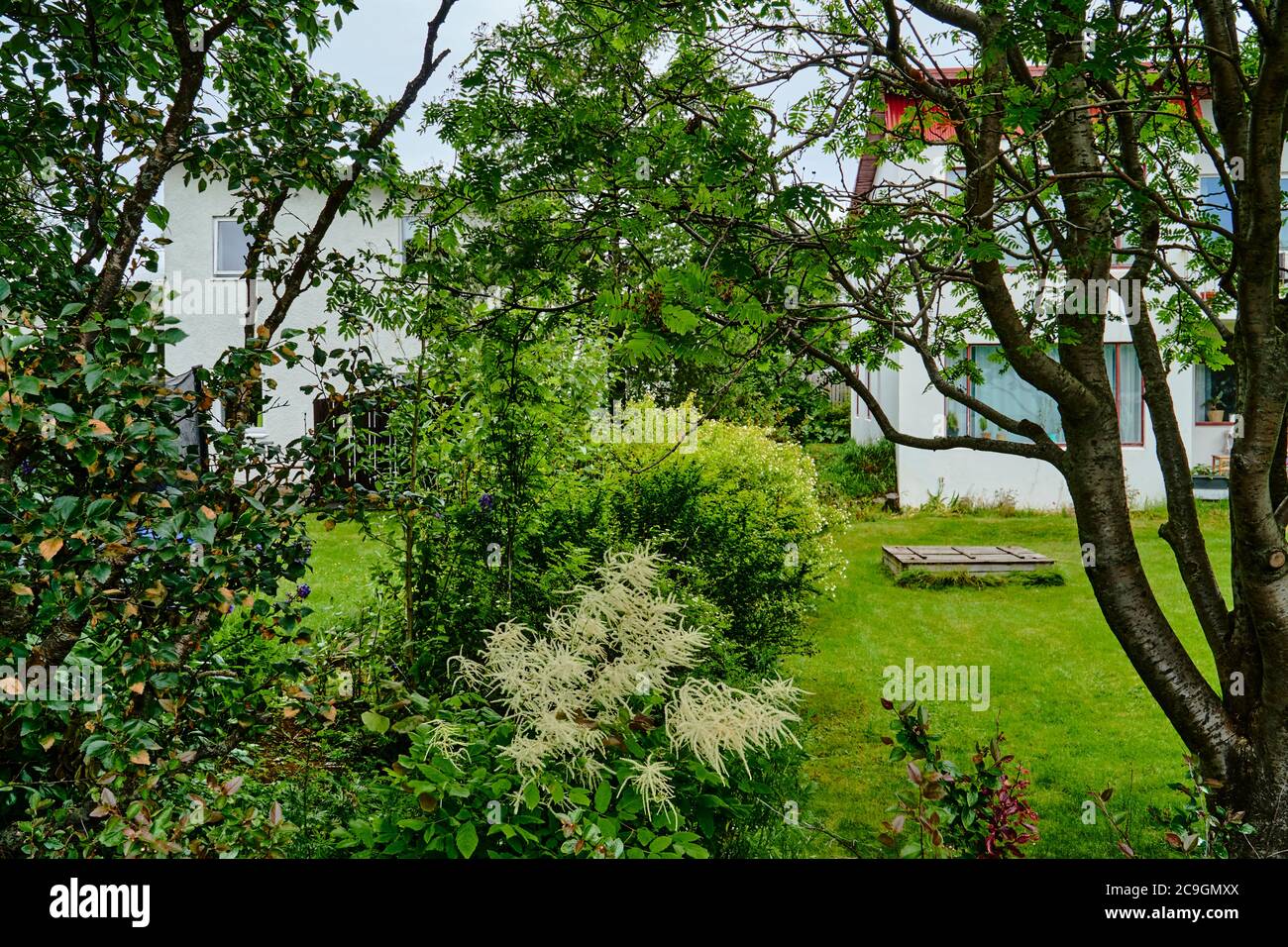 Architectural details and lush garden scenery in west Kópavogur, 50s ...