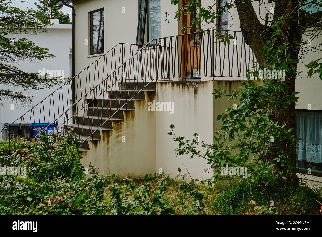 Architectural details and lush garden scenery in west Kópavogur, 50s ...