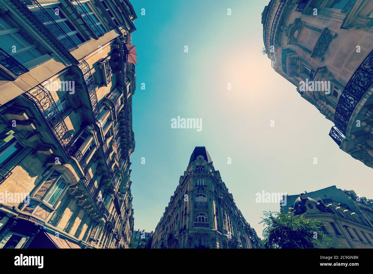 Luxury buildings in Paris under a shining sun, France Stock Photo - Alamy