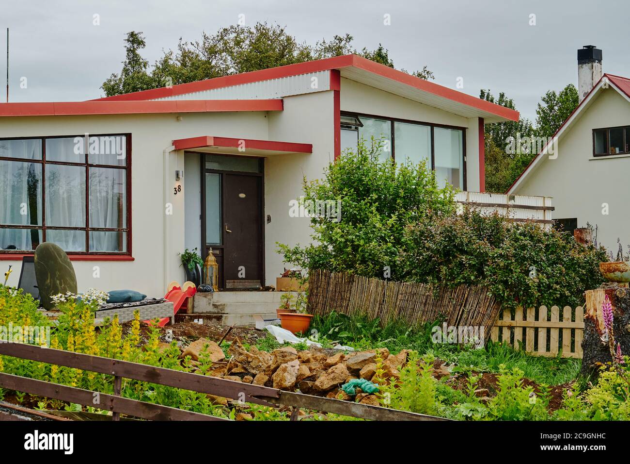 Architectural details and lush garden scenery in west Kópavogur, 50s ...