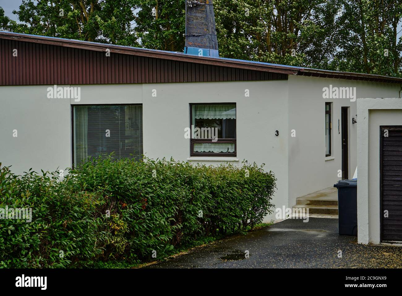 Architectural details and lush garden scenery in west Kópavogur, 50s ...