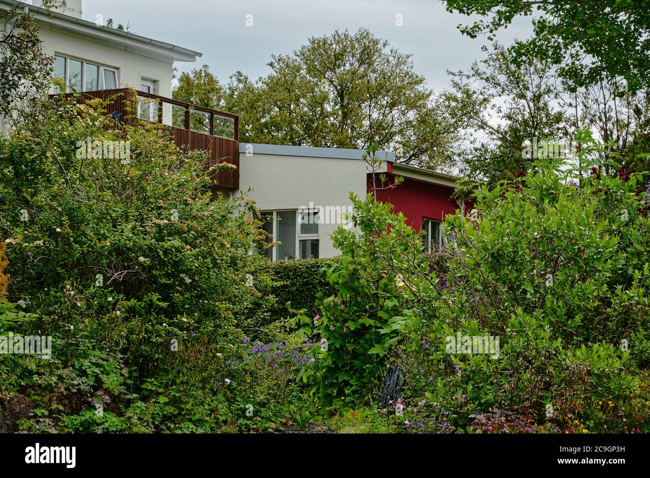 Architectural details and lush garden scenery in west Kópavogur, 50s ...
