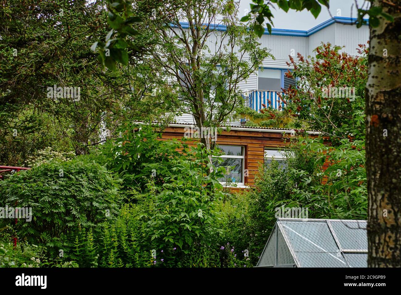 Architectural details and lush garden scenery in west Kópavogur, 50s ...