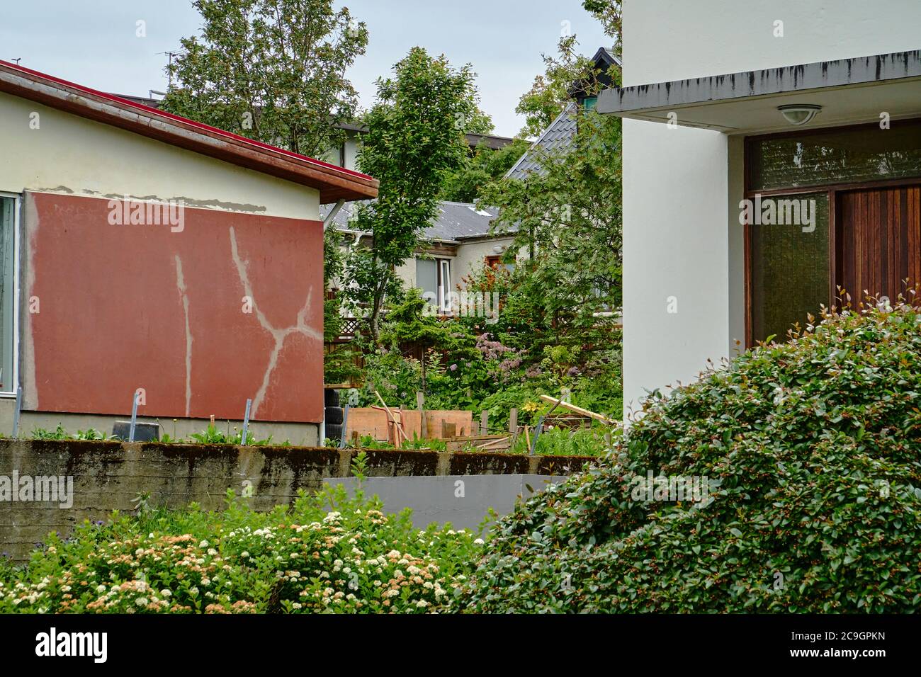 Architectural details and lush garden scenery in west Kópavogur, 50s ...