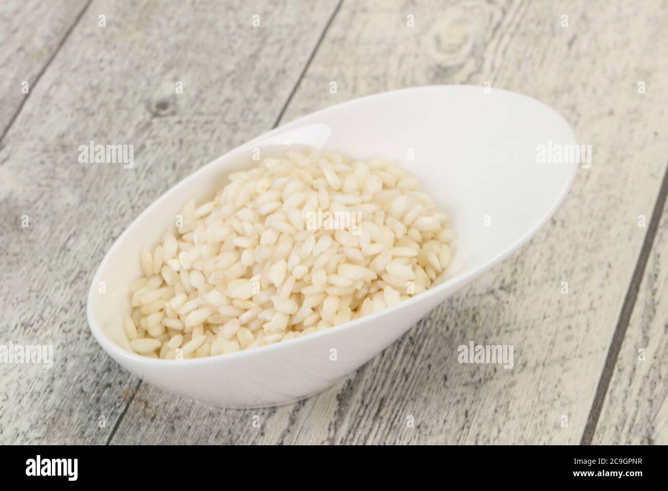 Raw Arborio rice for Italian risotto Stock Photo - Alamy