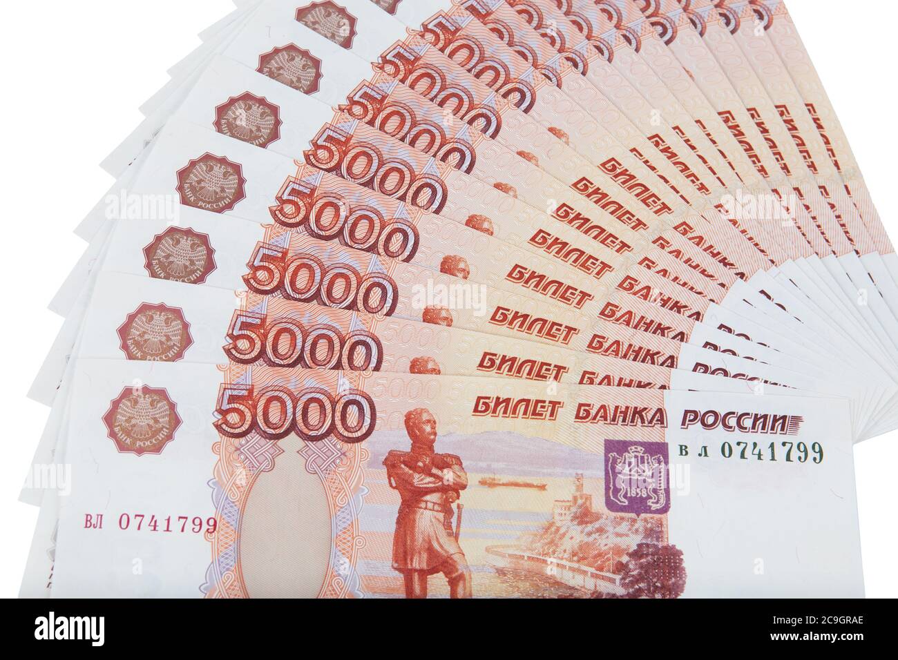 A bundle of banknotes of five thousand rubles on a white background ...