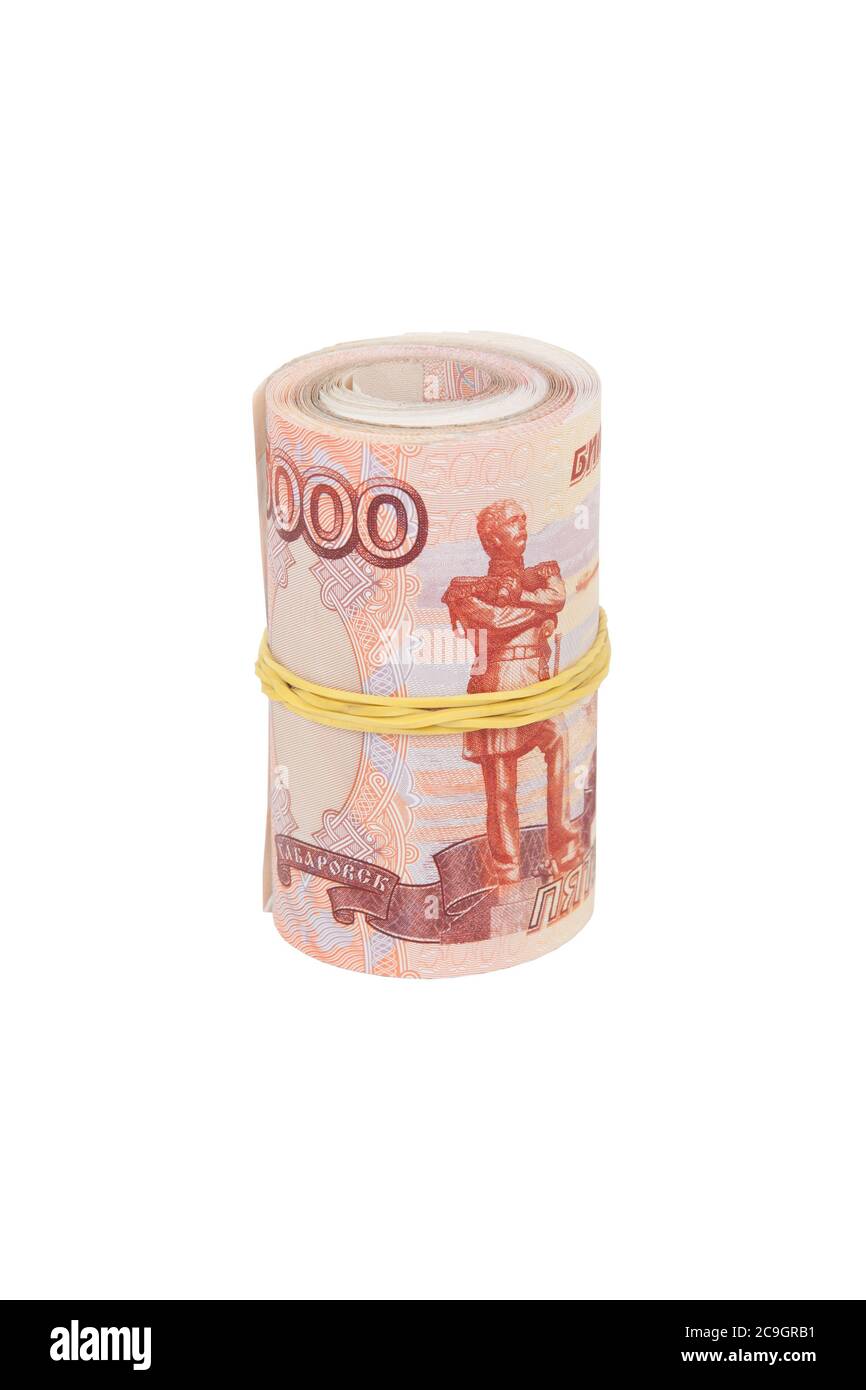 Bundle of banknotes puffed up in a straw and wrapped with an elastic ...