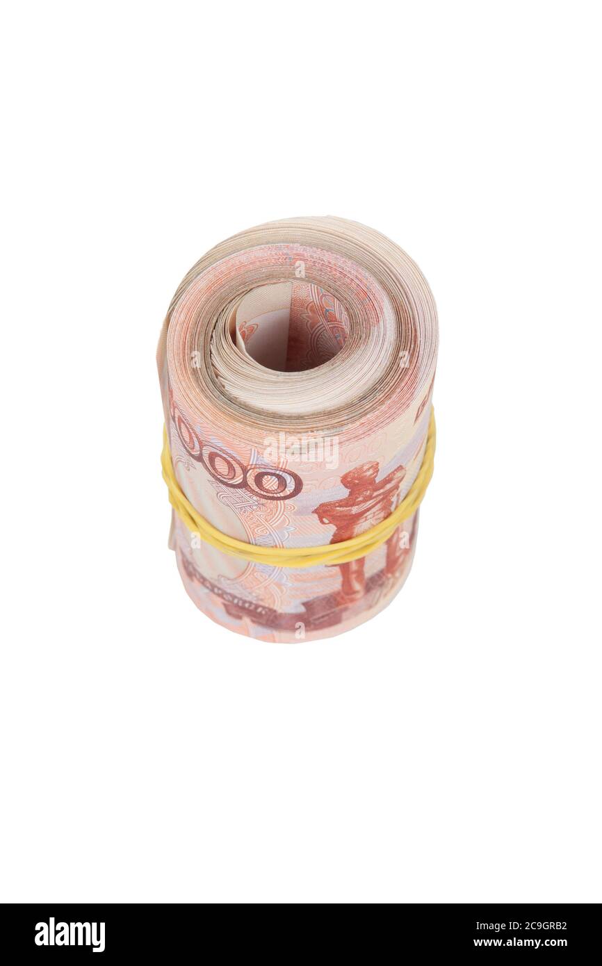 Bundle of banknotes puffed up in a straw and wrapped with an elastic ...