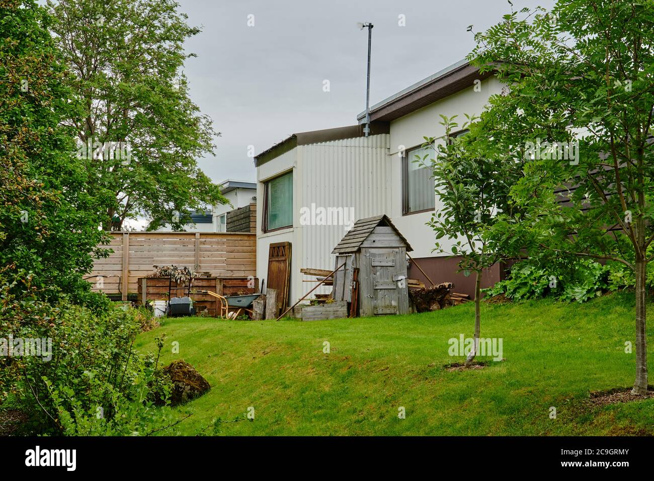 Architectural details and lush garden scenery in west Kópavogur, 50s ...
