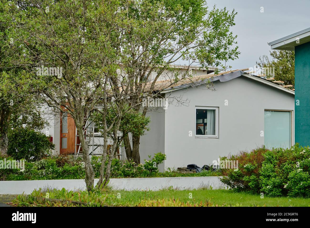 Architectural details and lush garden scenery in west Kópavogur, 50s ...