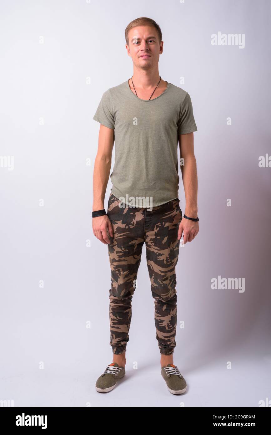 Portrait of man wearing clothes with military concept Stock Photo - Alamy