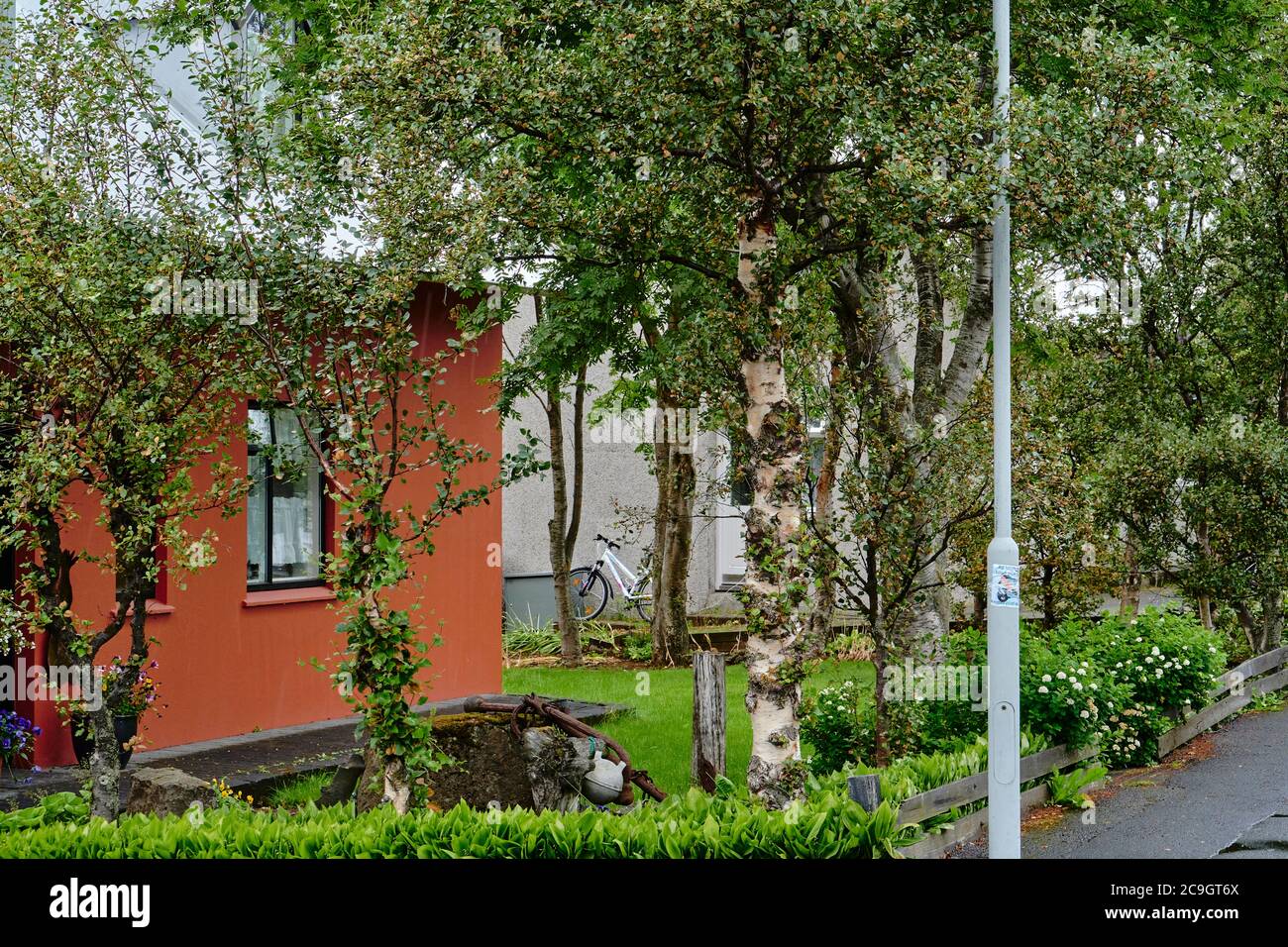 Architectural details and lush garden scenery in west Kópavogur, 50s ...
