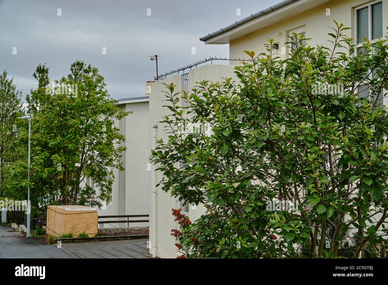 Architectural details and lush garden scenery in west Kópavogur, 50s ...