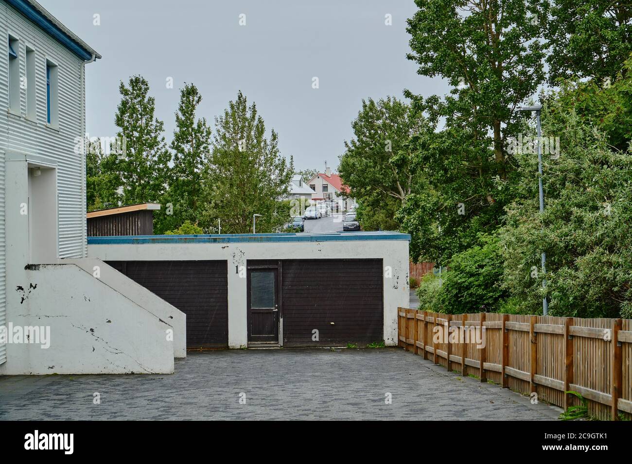 Architectural details and lush garden scenery in west Kópavogur, 50s ...