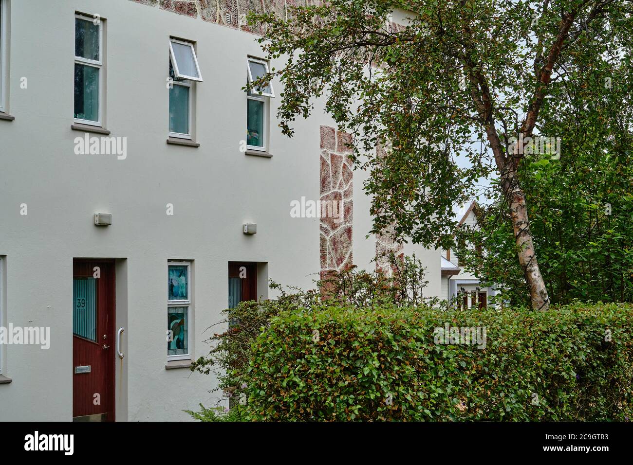 Architectural details and lush garden scenery in west Kópavogur, 50s ...