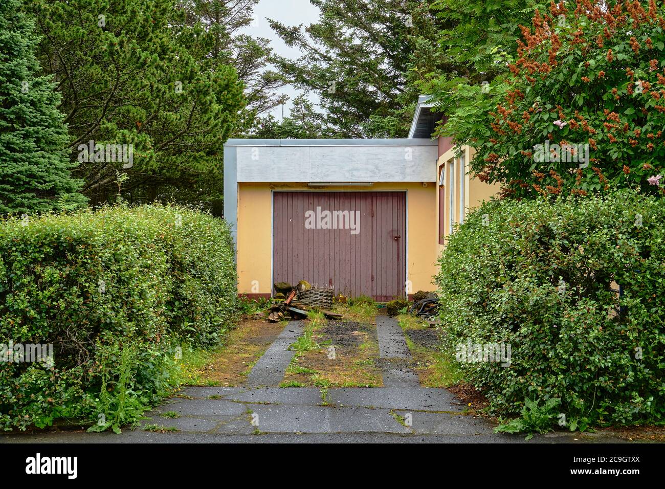 Architectural details and lush garden scenery in west Kópavogur, 50s ...