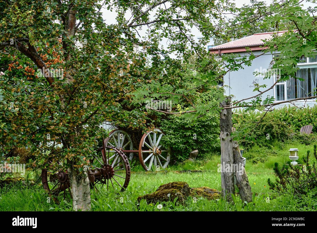 Architectural details and lush garden scenery in west Kópavogur, 50s ...