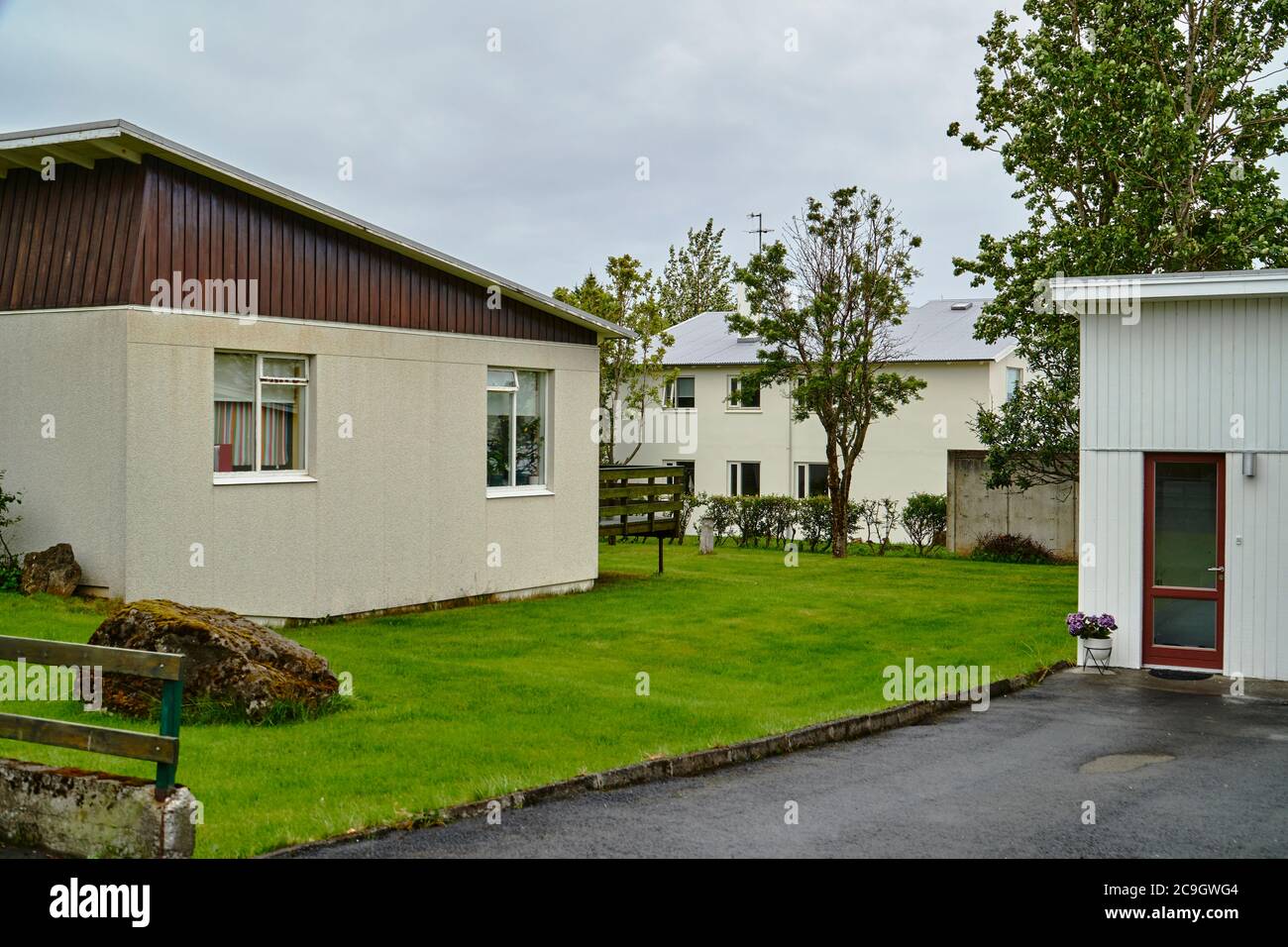 Architectural details and lush garden scenery in west Kópavogur, 50s ...