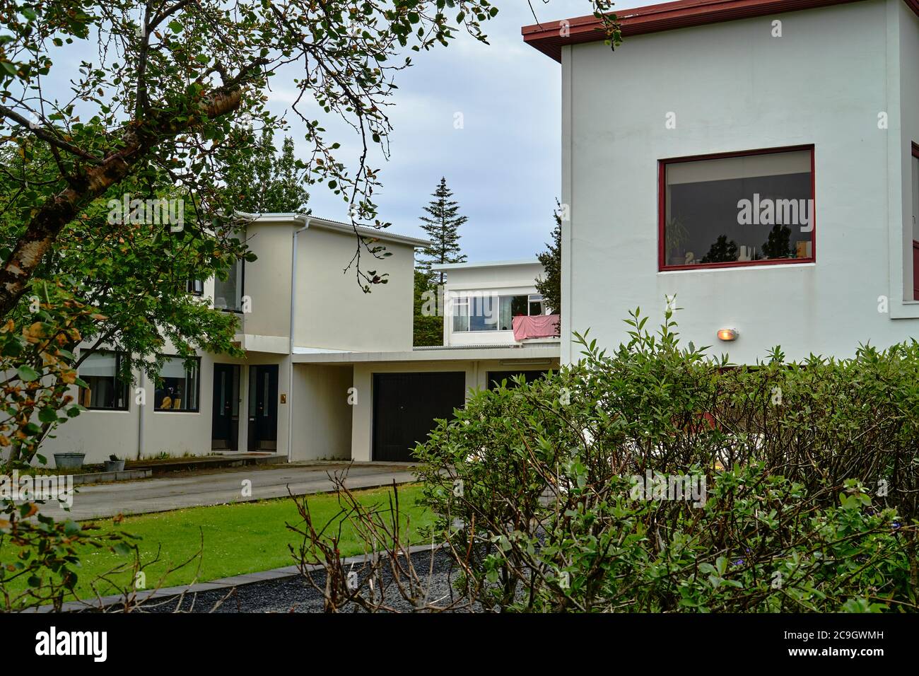 Architectural details and lush garden scenery in west Kópavogur, 50s ...