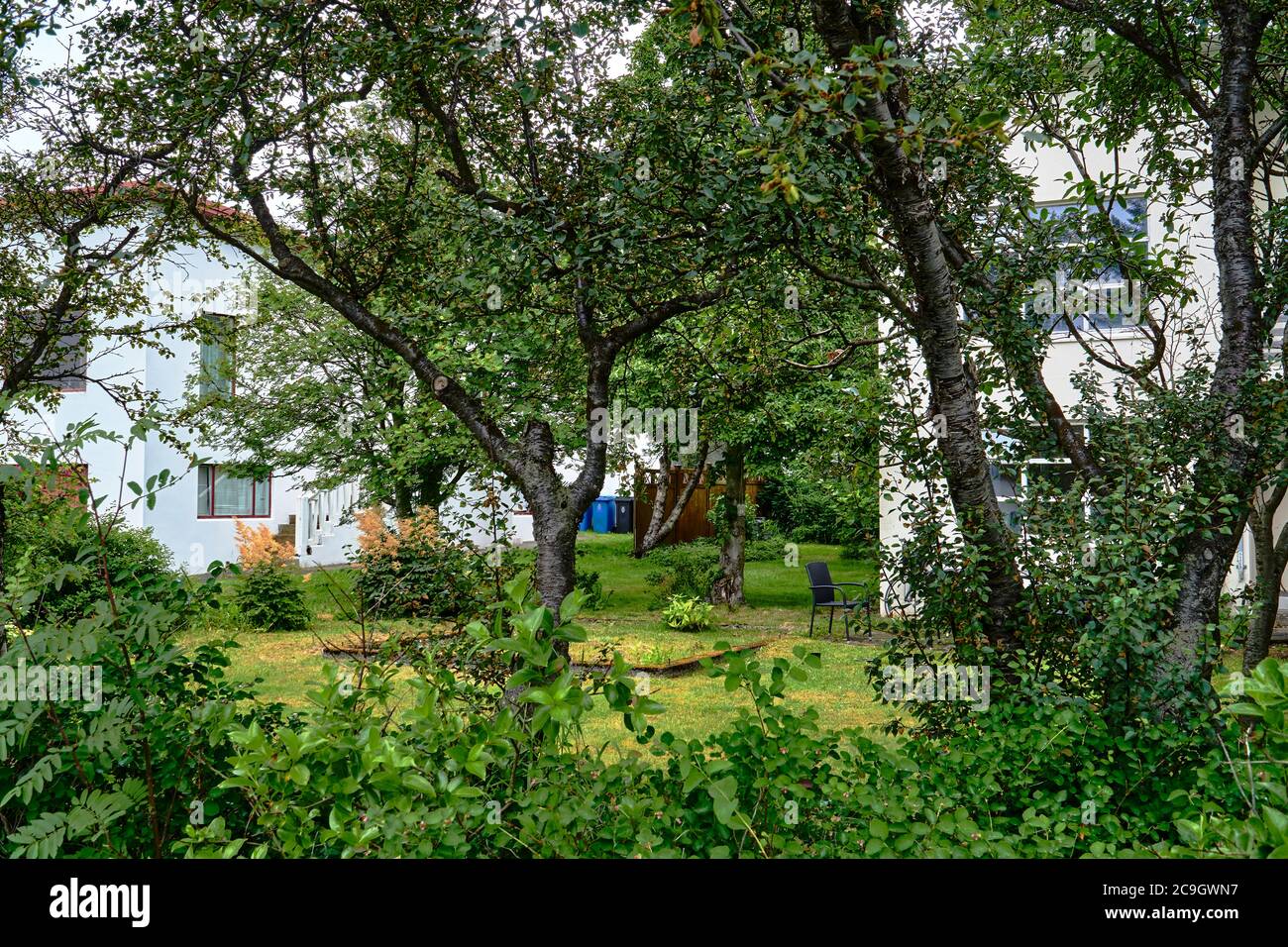 Architectural details and lush garden scenery in west Kópavogur, 50s ...