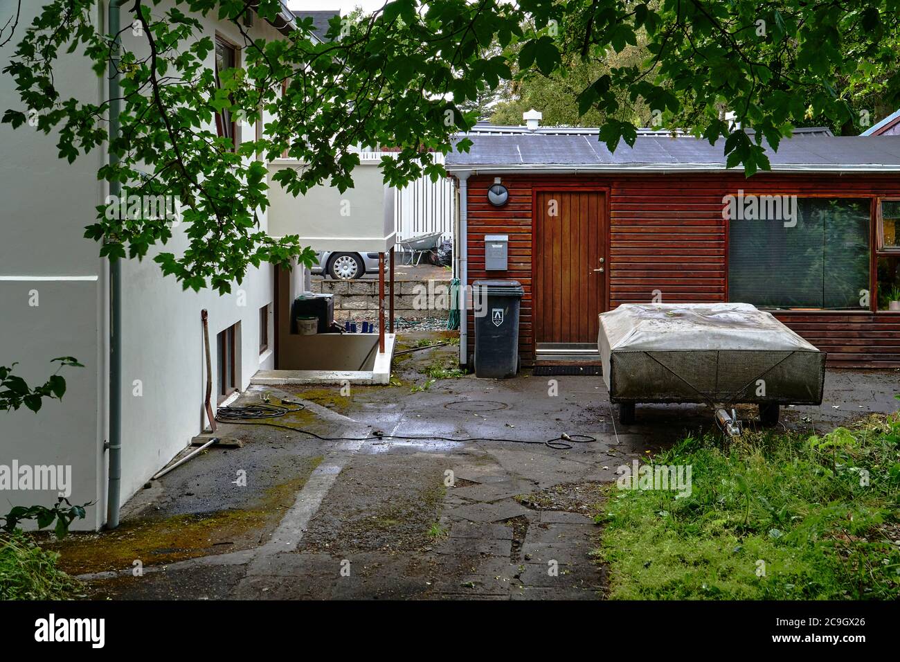 Architectural details and lush garden scenery in west Kópavogur, 50s ...