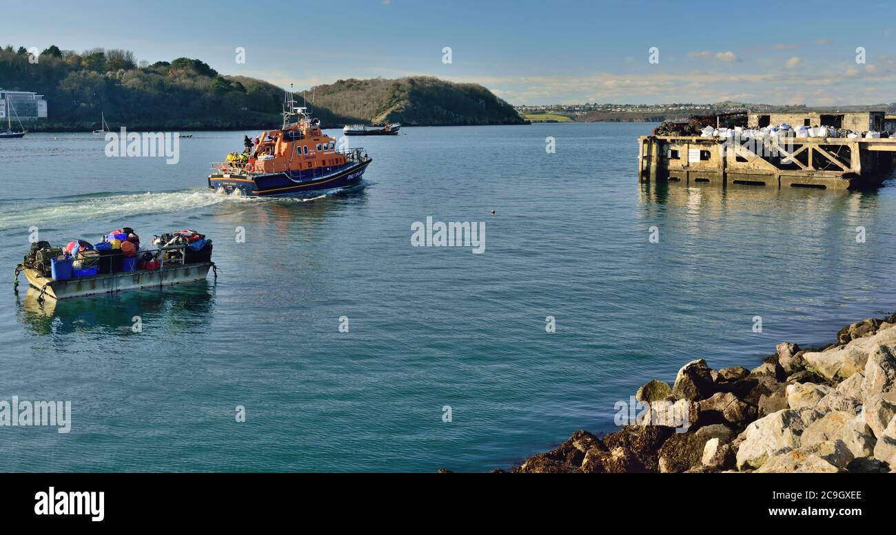 RNLI Torbay lifeboat leaving Brixham harbour Stock Photo - Alamy